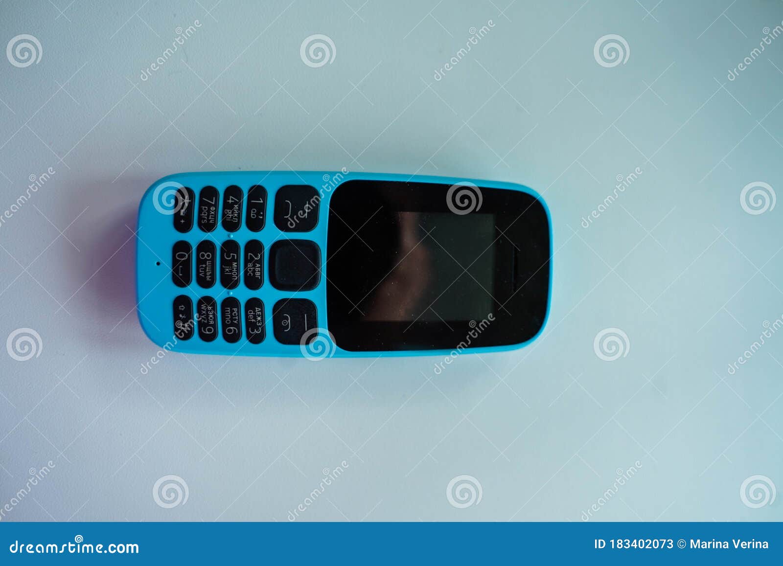 Blue Push-button Cell Phone With Black Buttons Stock Image - Image of ...