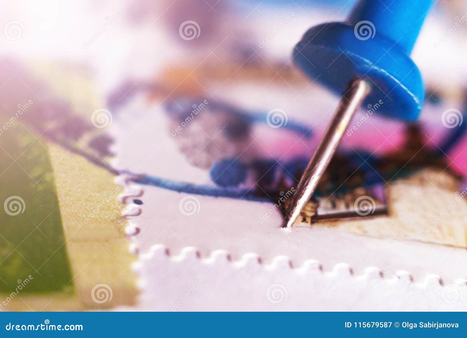 Blue Pushpin on Colored Paper Stock Image - Image of colored, fastener ...