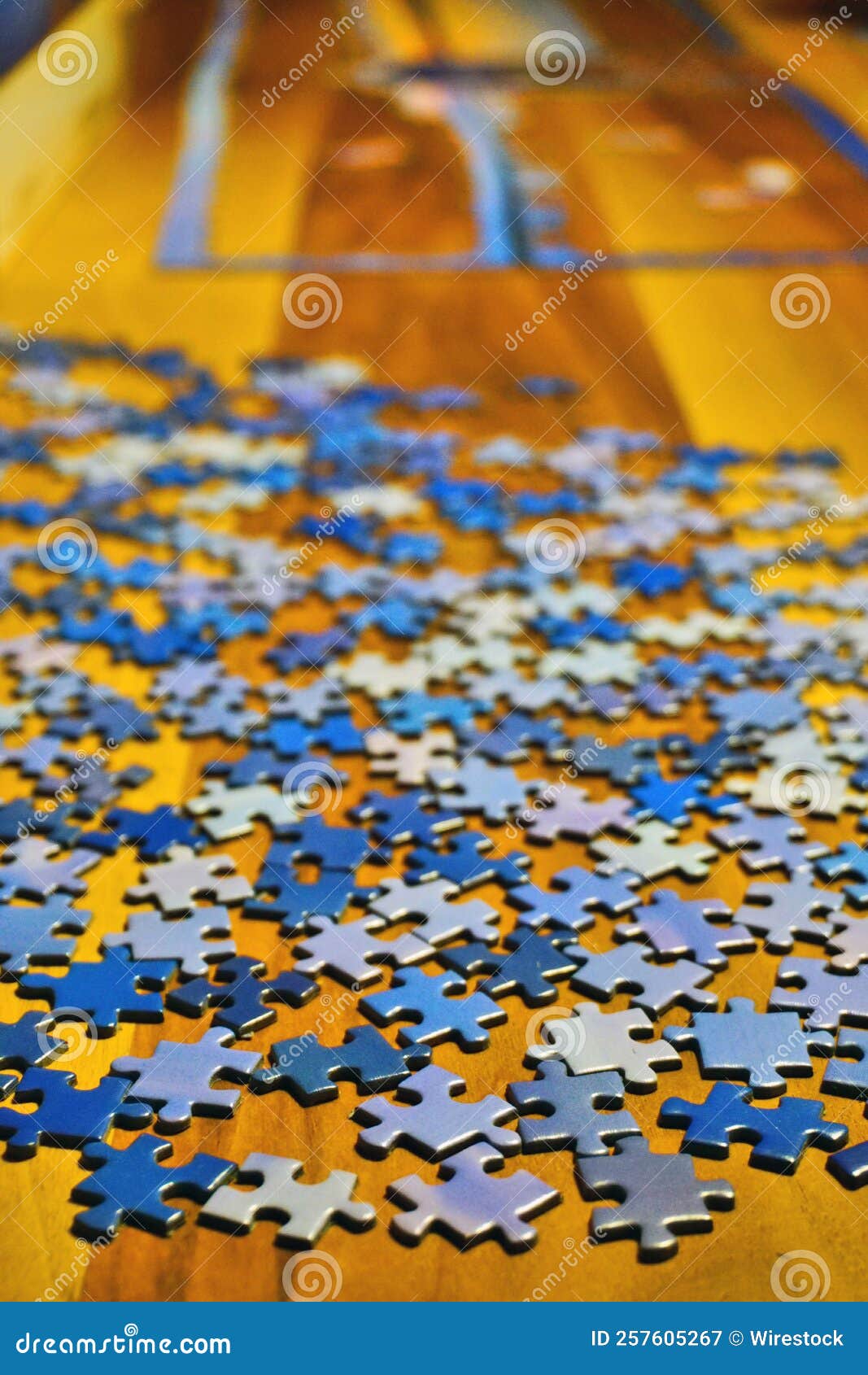 Blue Puzzle Tabs on the Wooden Table, Vertical, Close-up Stock Image ...
