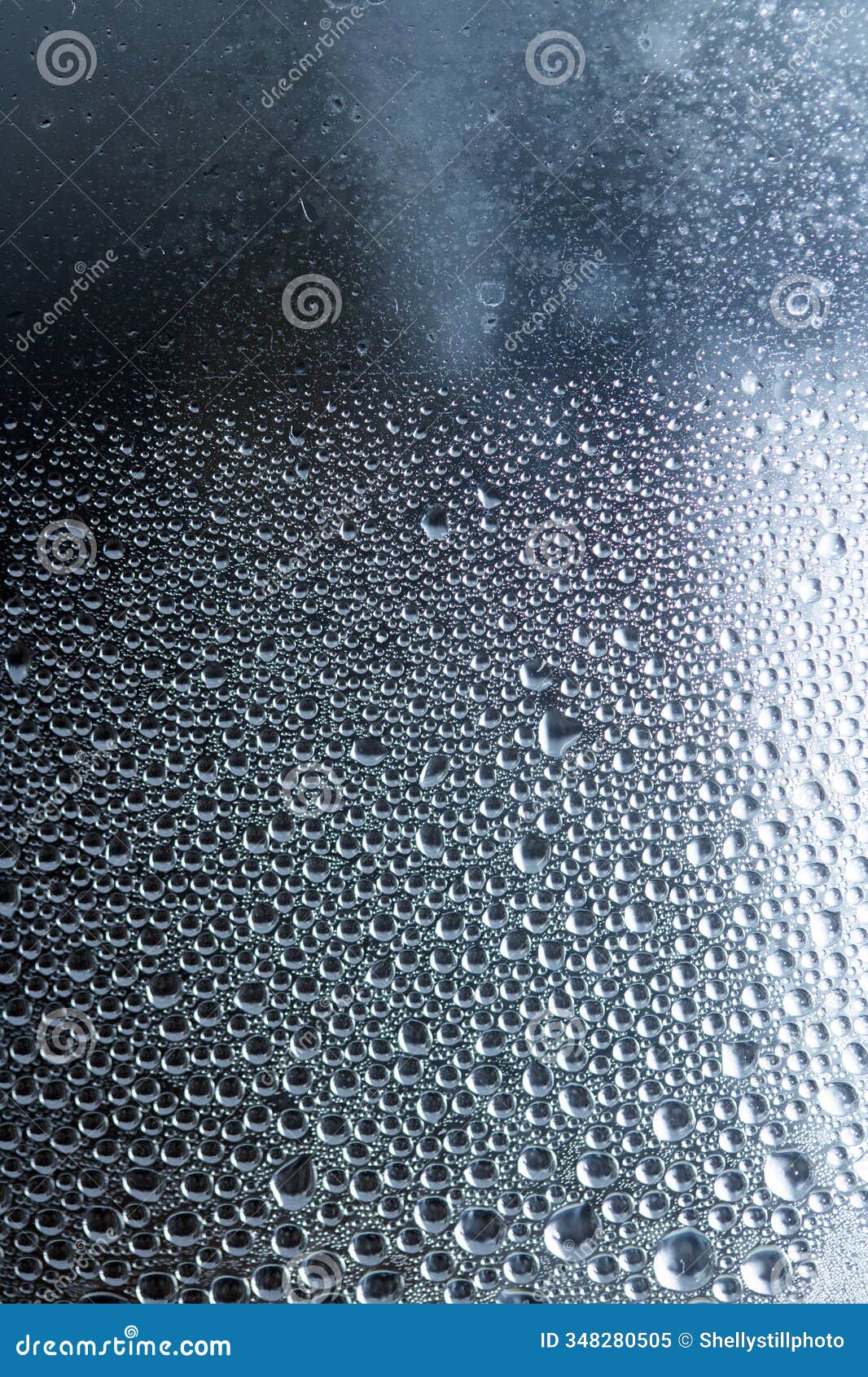 Blue Rain Bubbles Drops Running Down a Window on a Wet Day Abstract ...