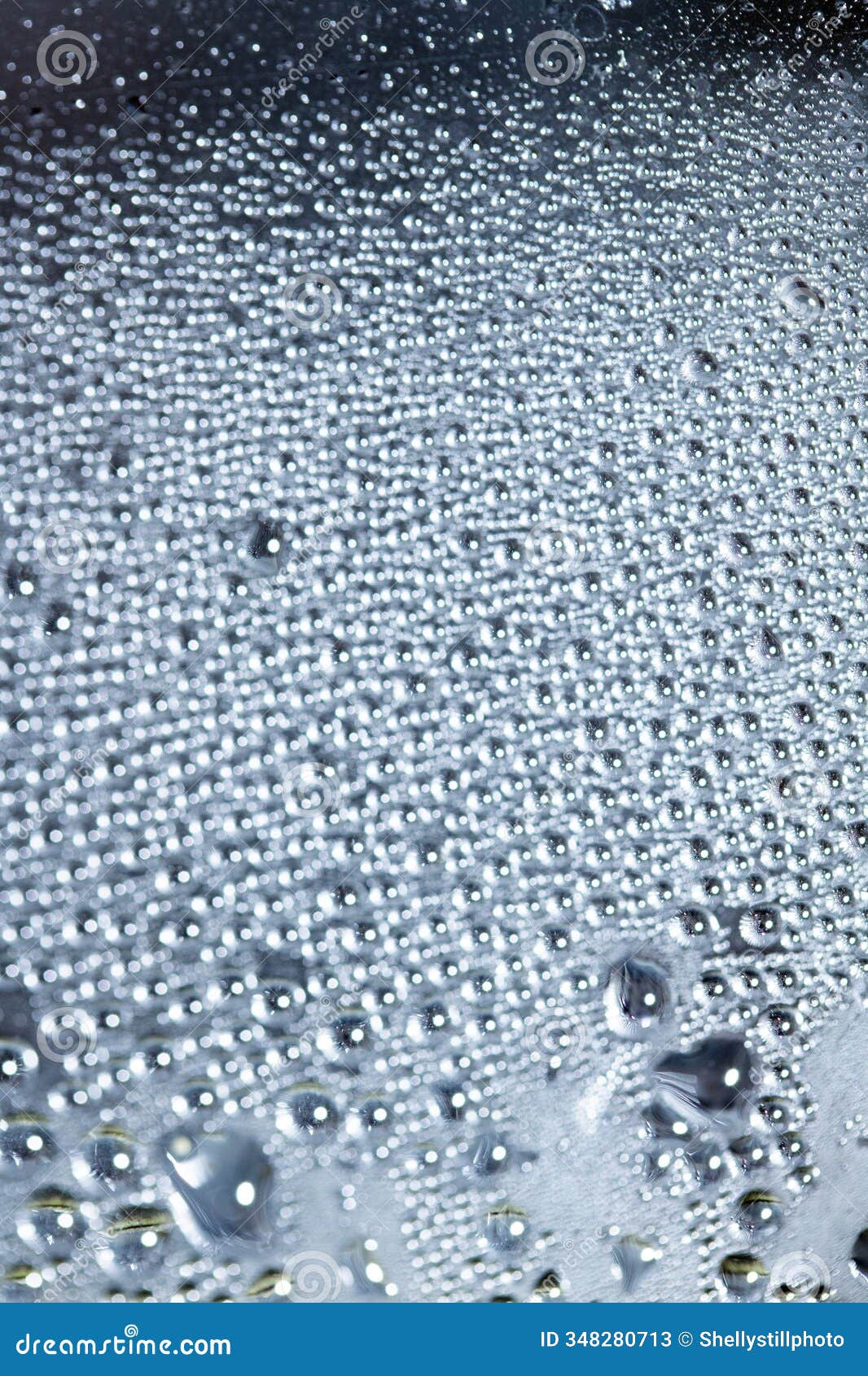 Blue Rain Bubbles Drops Running Down a Window on a Wet Day Abstract ...