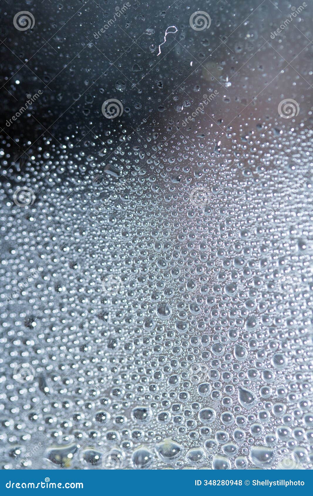 Blue Rain Bubbles Drops Running Down a Window on a Wet Day Abstract ...