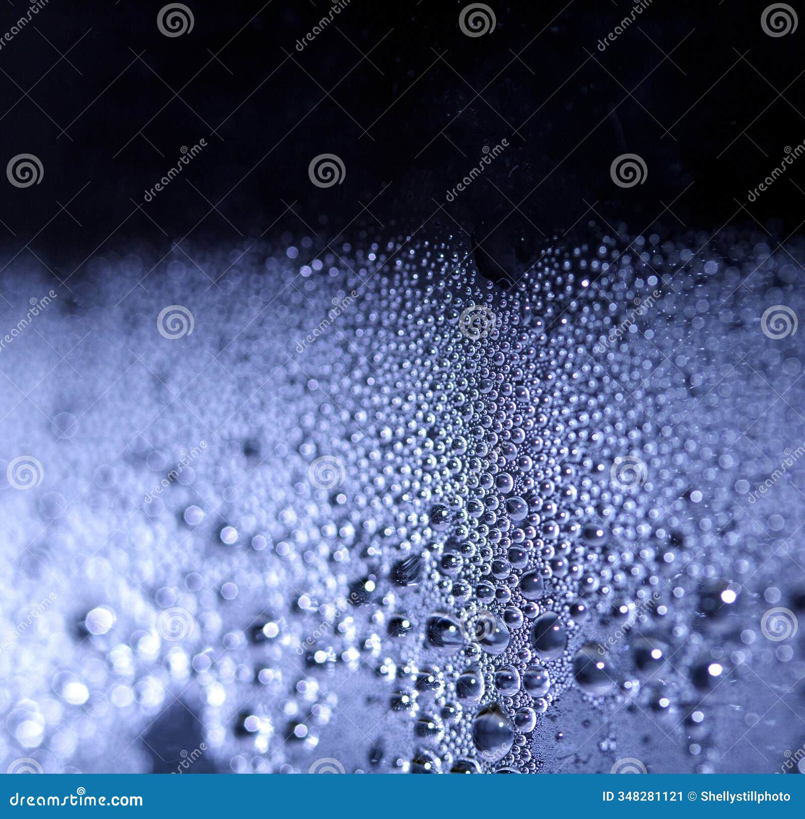 Blue Rain Bubbles Drops Running Down a Window on a Wet Day Abstract ...