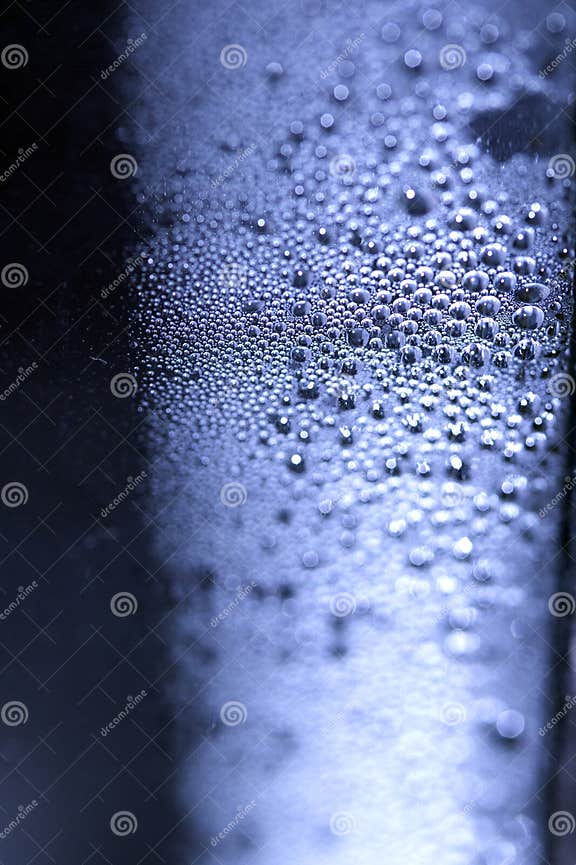 Blue Rain Bubbles Drops Running Down a Window on a Wet Day Abstract ...