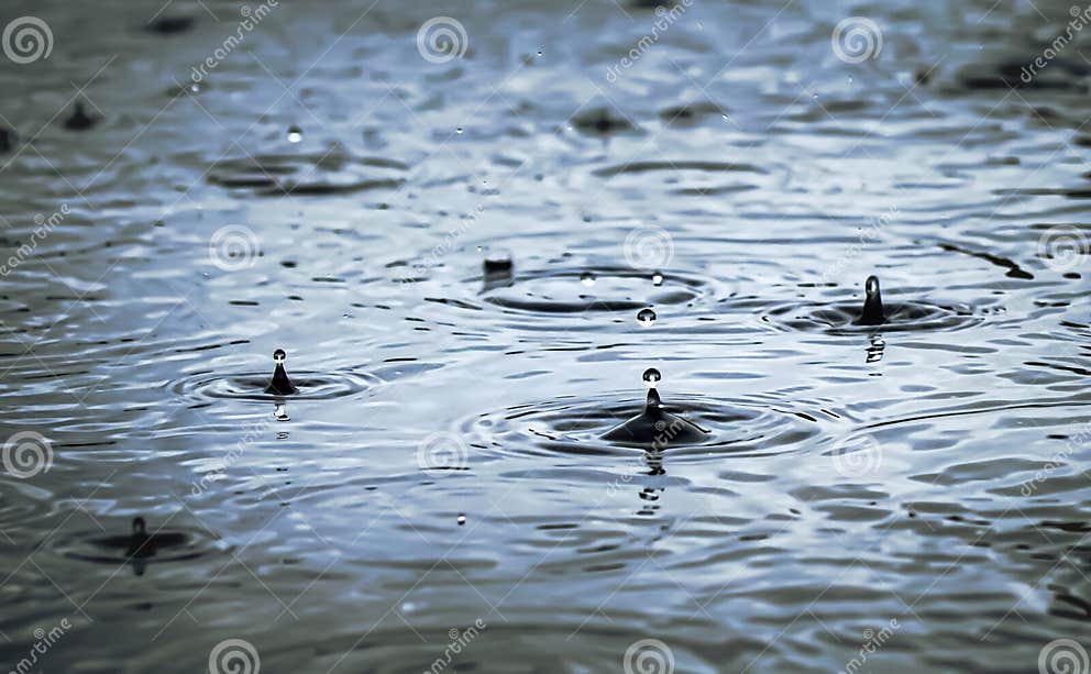 Blue Rain Drops Falling on the Ground Stock Image - Image of purity ...