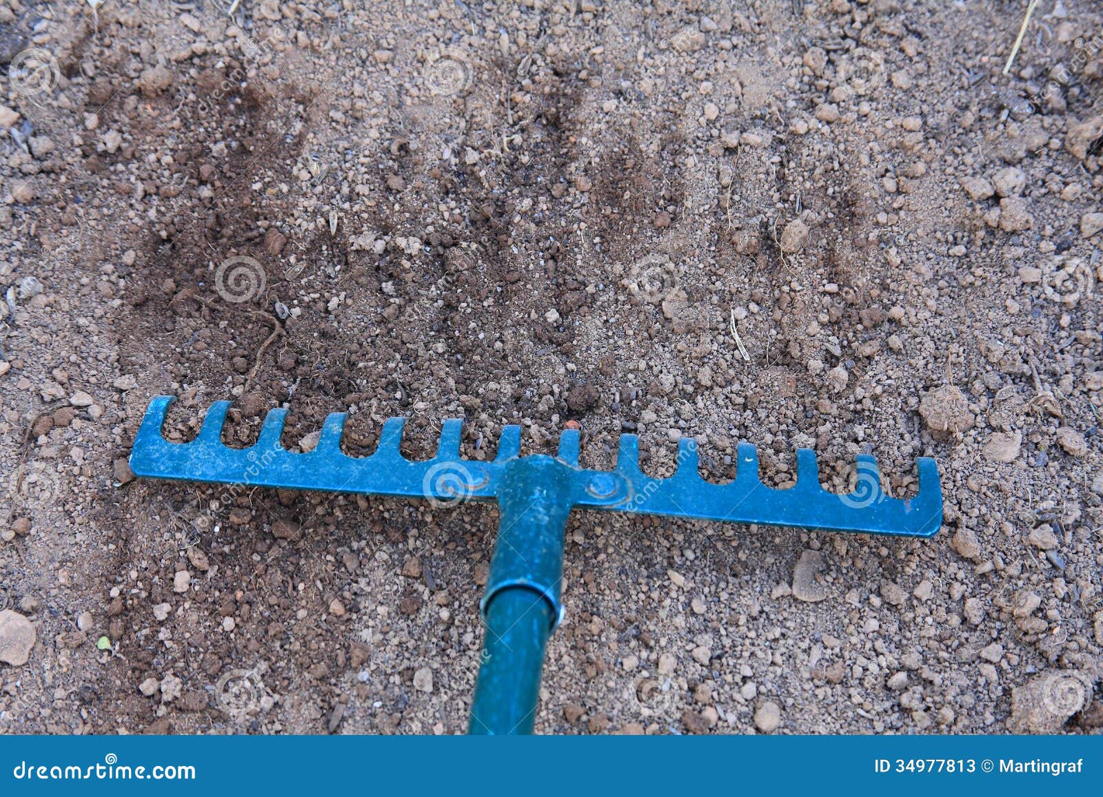 Blue Rake in Dry Soil Contrast of Color Stock Image - Image of arable ...