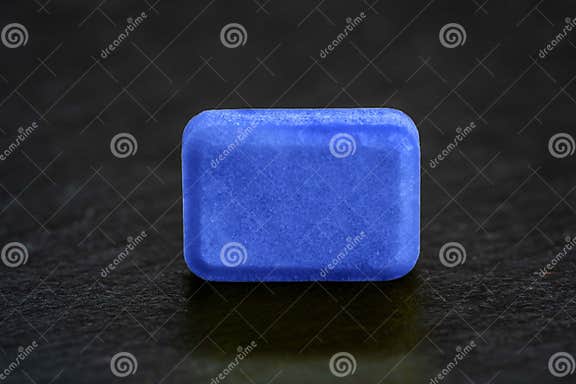 Blue Rectangular Pill on Black Background Stock Photo - Image of ...