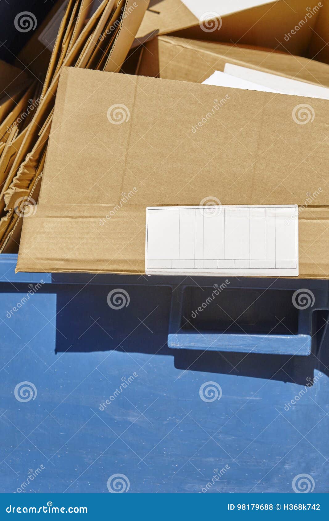 Blue Recycling Container for Paper with Cardboard Boxes. Stock Photo ...