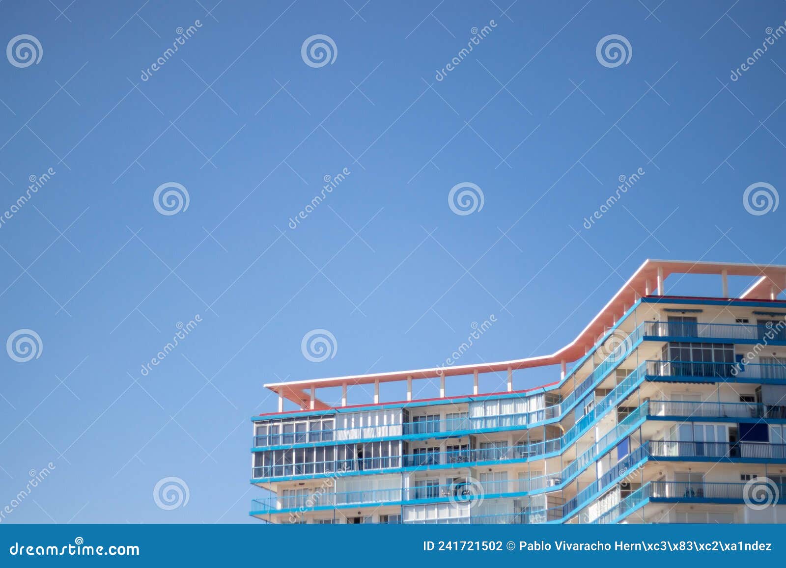 Blue and Red Building with Blue Sky in the Background Editorial ...
