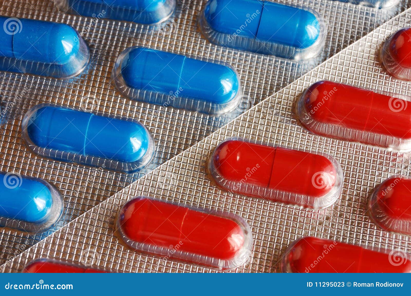 Blue and red pills stock image. Image of isolated, capsule - 11295023
