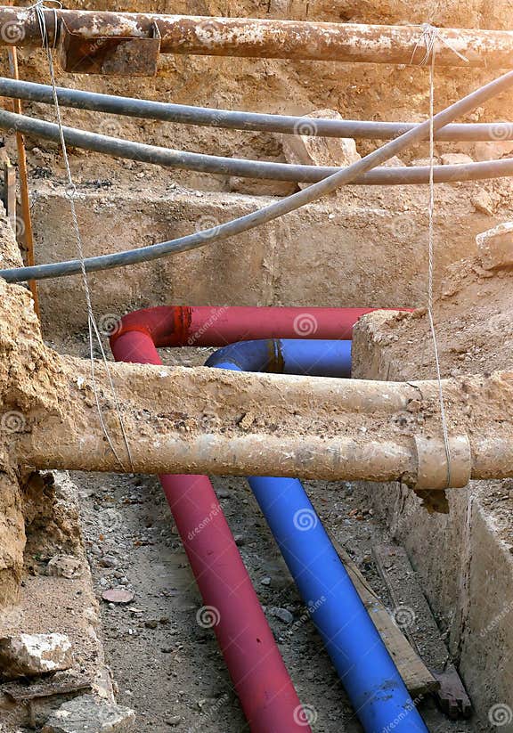 Blue and Red Water Pipe in the Ground Stock Photo - Image of plastic ...