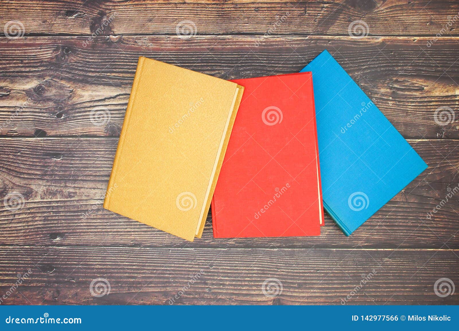 Blue Red and Yellow Book on the Table Stock Photo - Image of letter ...