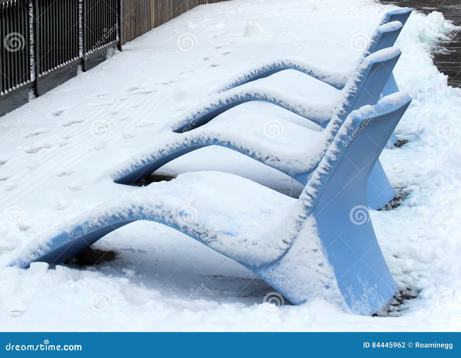 Blue resin lounge chairs stock photo. Image of snowfall - 84445962