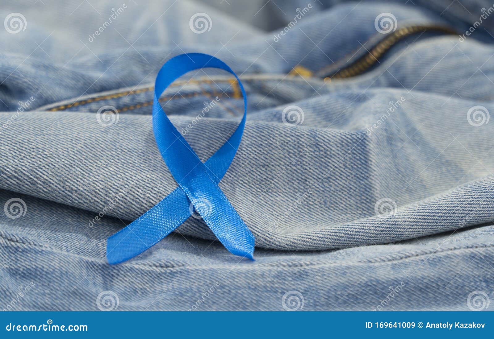 Blue Ribbon for Prostate Cancer Awareness on Blue Demin with Copyspace ...