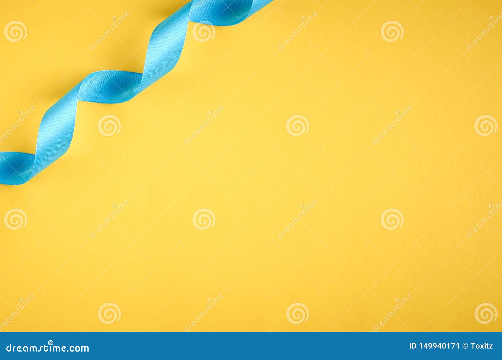 Blue Ribbon on Yellow Background Composition, Flat Lay Stock Image ...