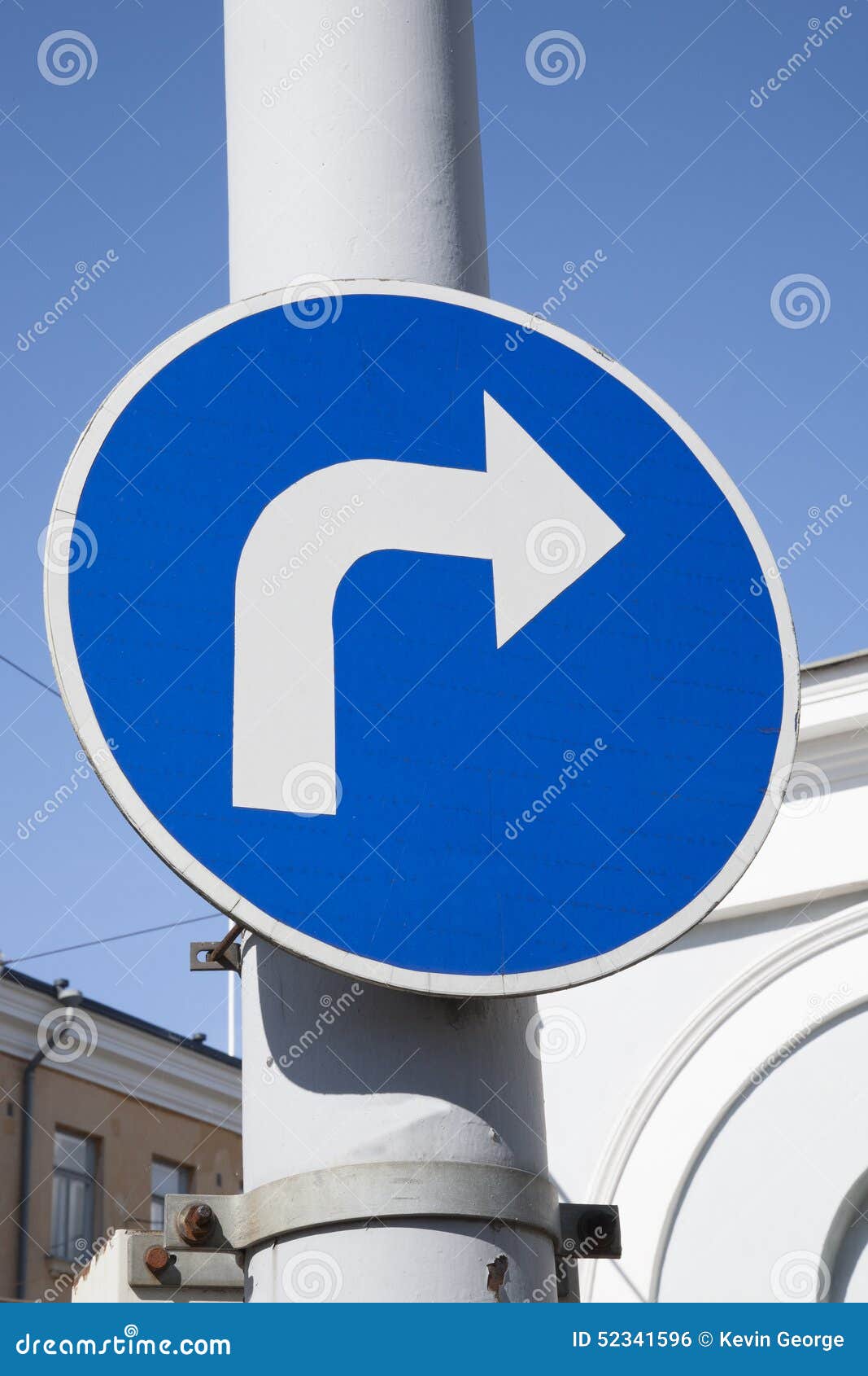 Blue Right Hand Turn Sign stock photo. Image of white - 52341596