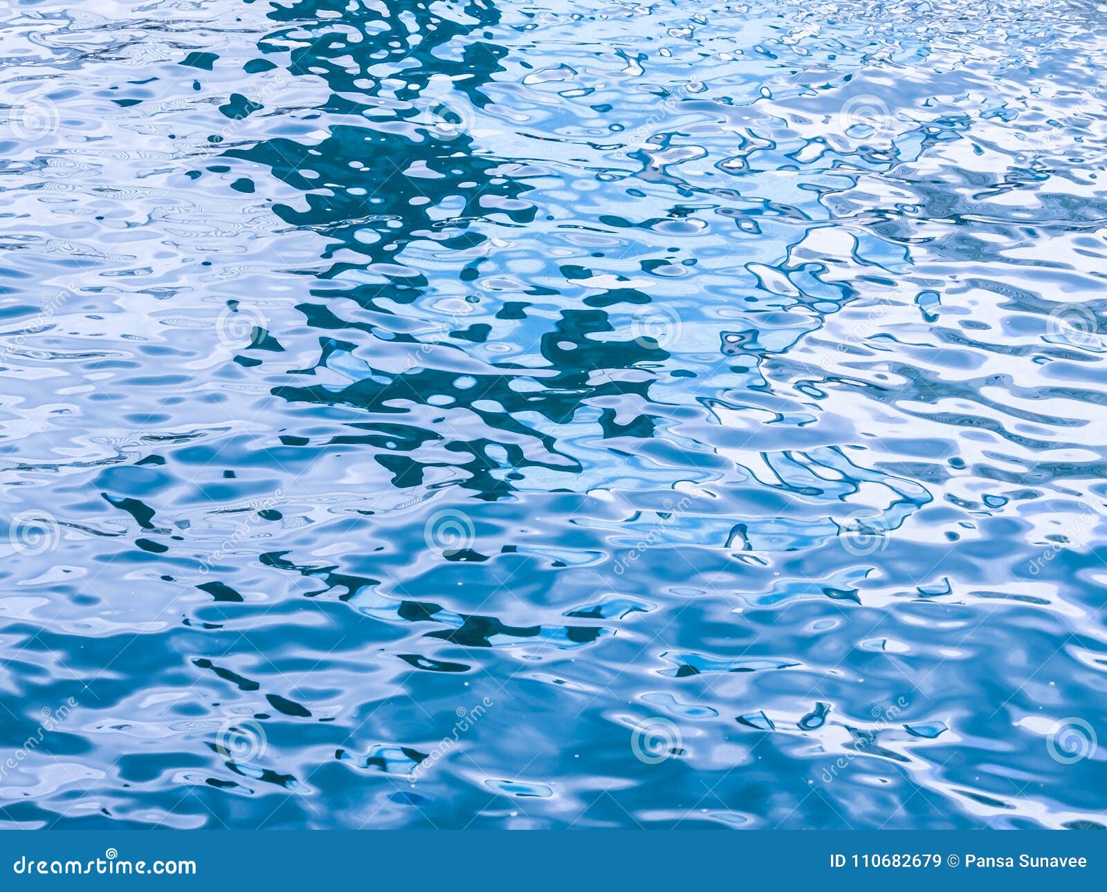 Blue water surface stock image. Image of reflection - 110682679