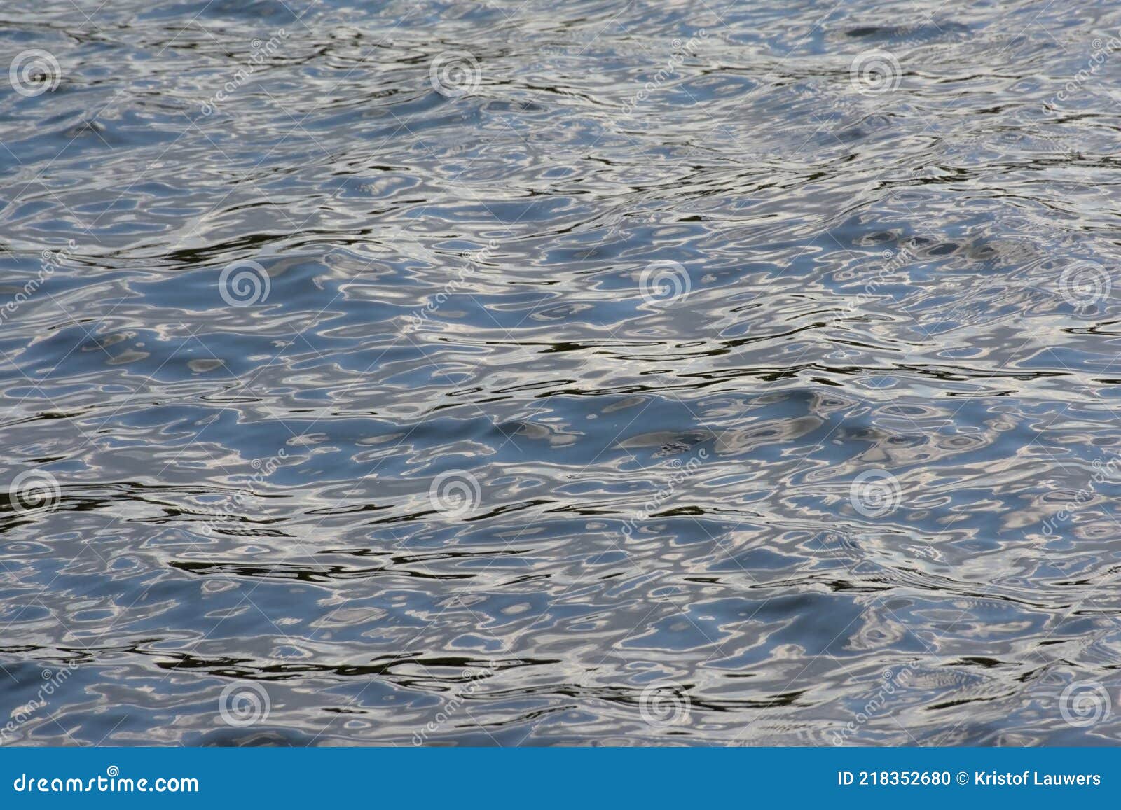 Blue Rippling Water Surface with Light Reflections Stock Photo - Image ...