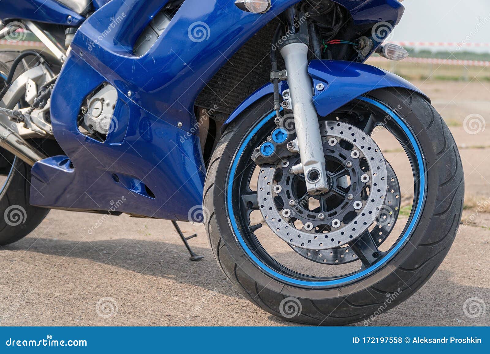 Blue Road Bike Front Wheel with Disc Brake Stock Photo - Image of bike ...