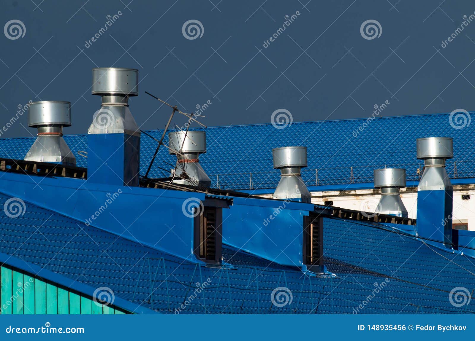 Blue Roof and Ventilation Pipes on it Stock Photo - Image of background ...