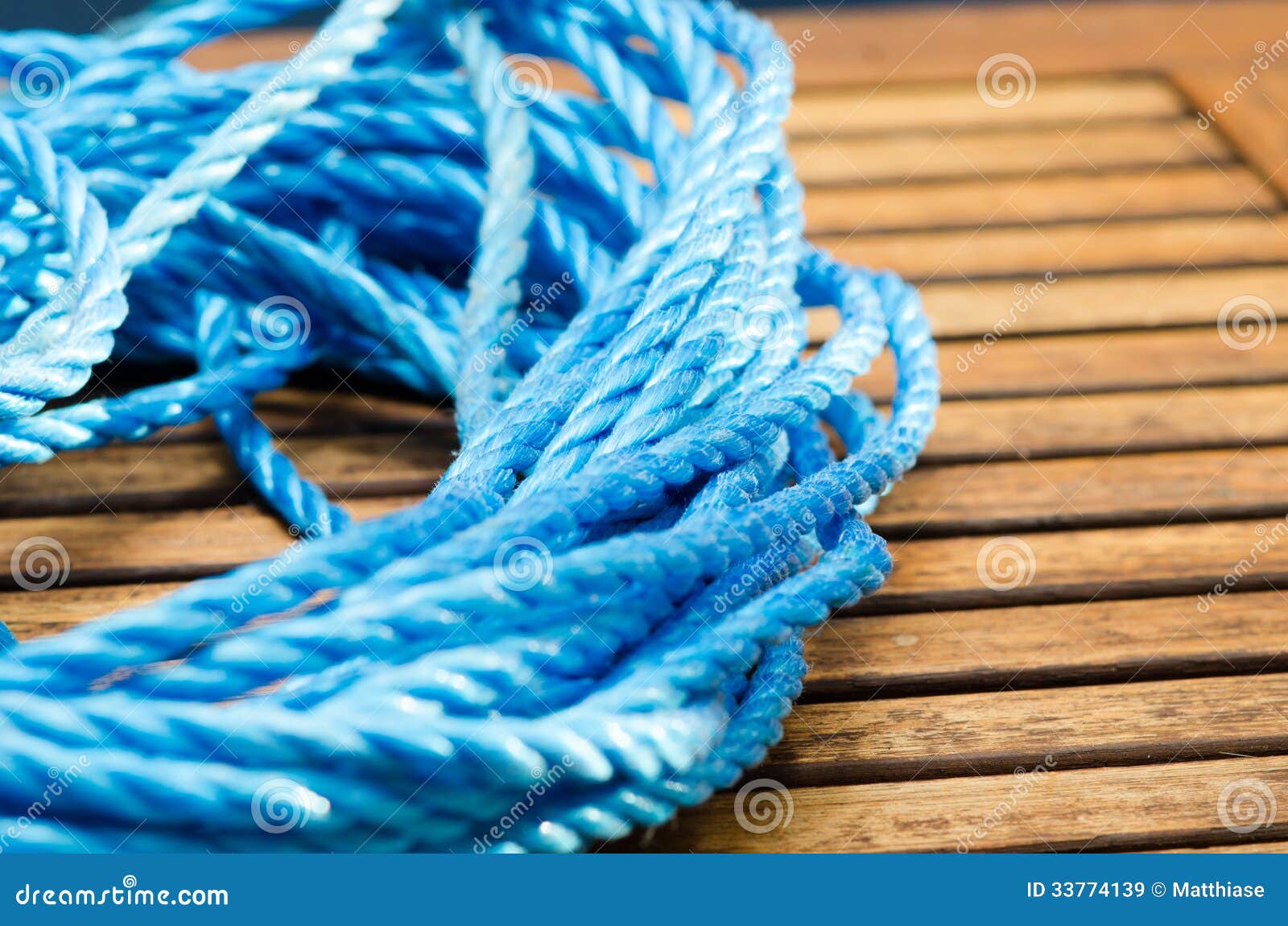 Blue rope on boat deck stock image. Image of closeup - 33774139