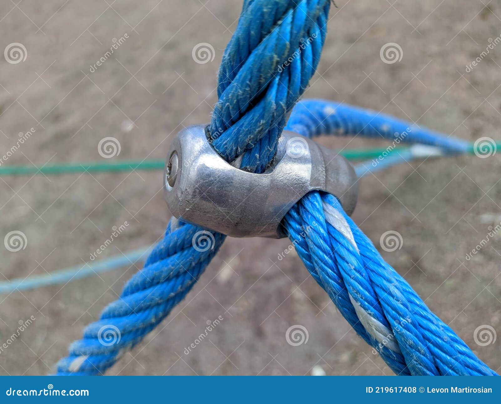 Blue Rope Cables Fastened Together with a Metal Fastener Stock Photo ...