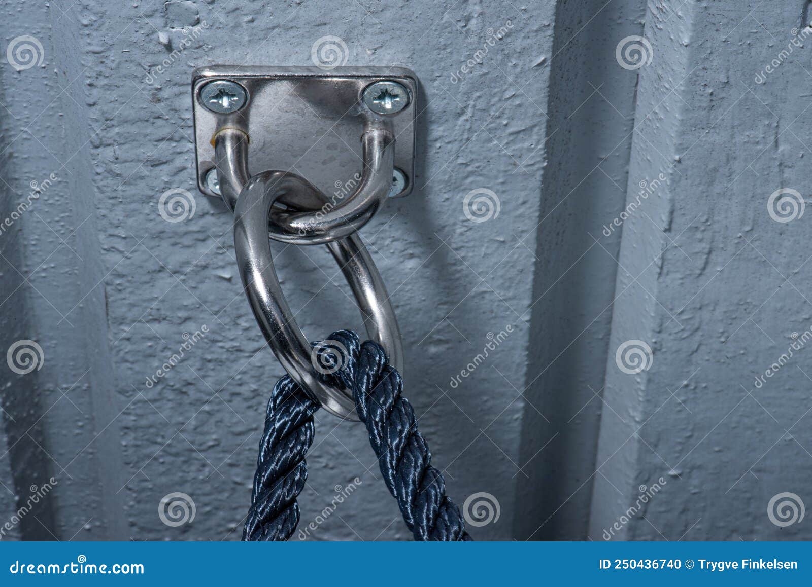 Blue Rope Going through a Stowage Bracket Ojn a Wall.. Stock Photo ...