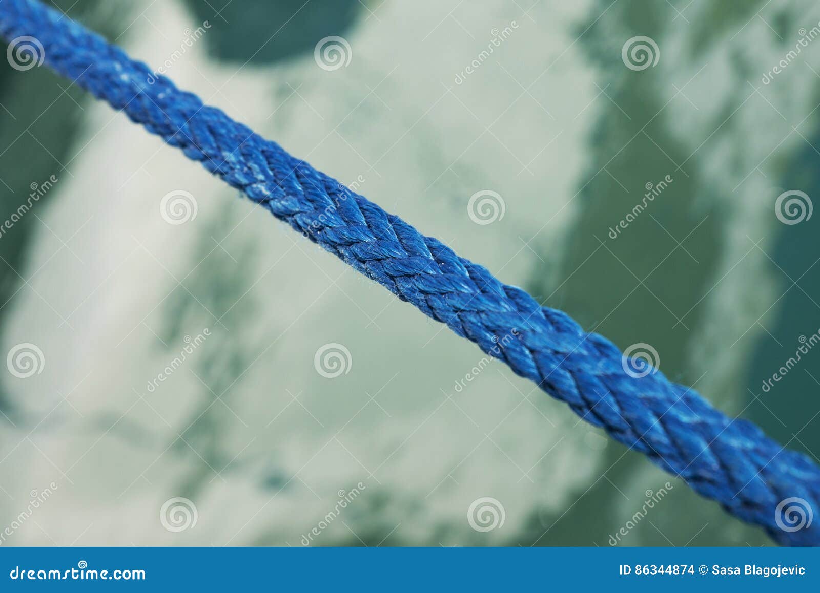 The blue ropes over water stock photo. Image of ropes - 86344874