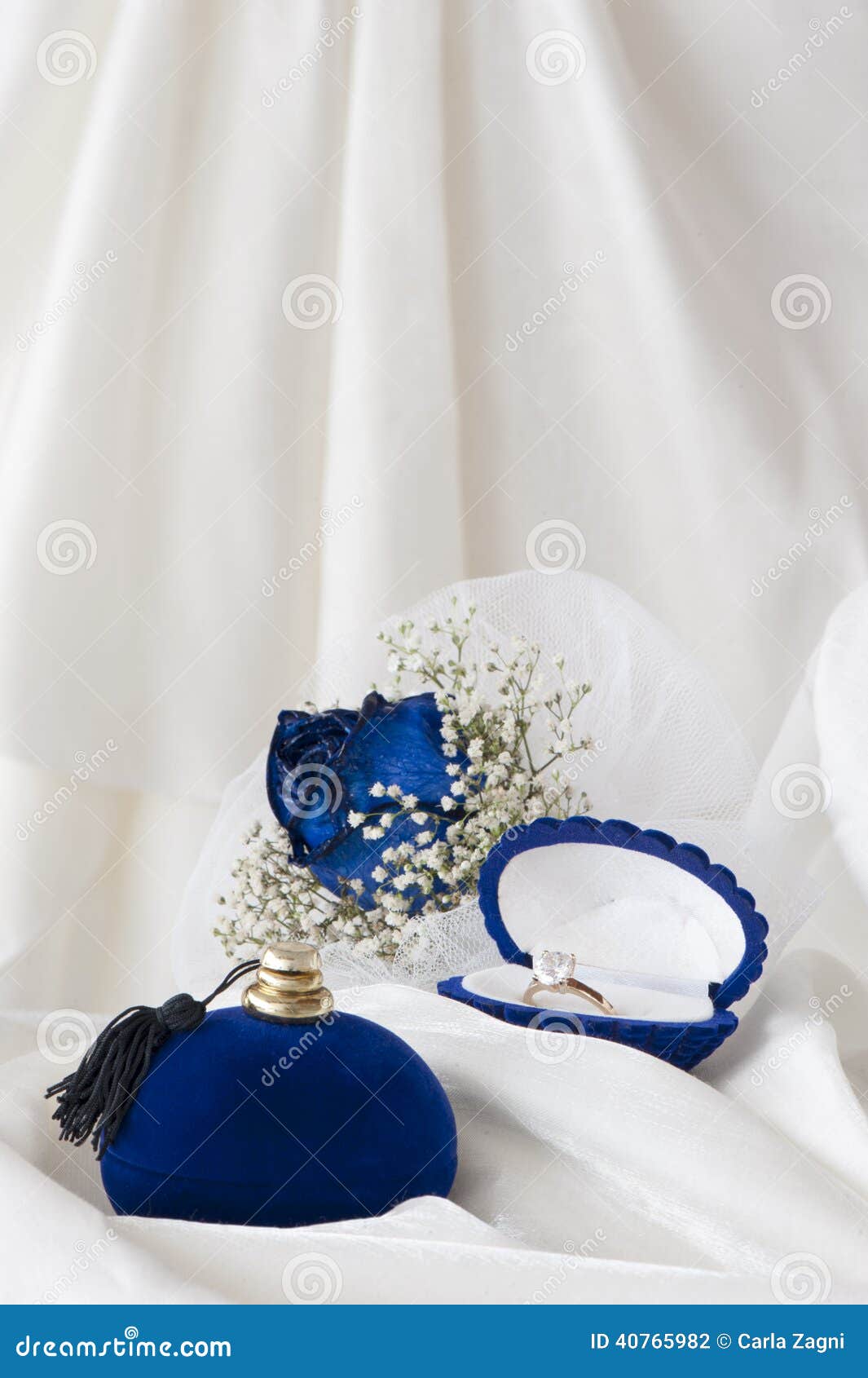 A Blue Roses and Wedding Rings Stock Photo - Image of bouquet, love ...