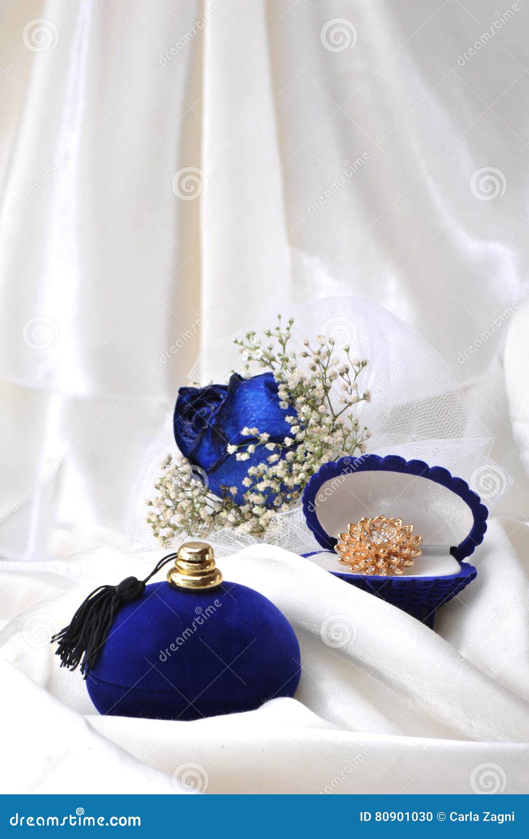 A Blue Roses and Wedding Rings Stock Photo - Image of flower, diamond ...