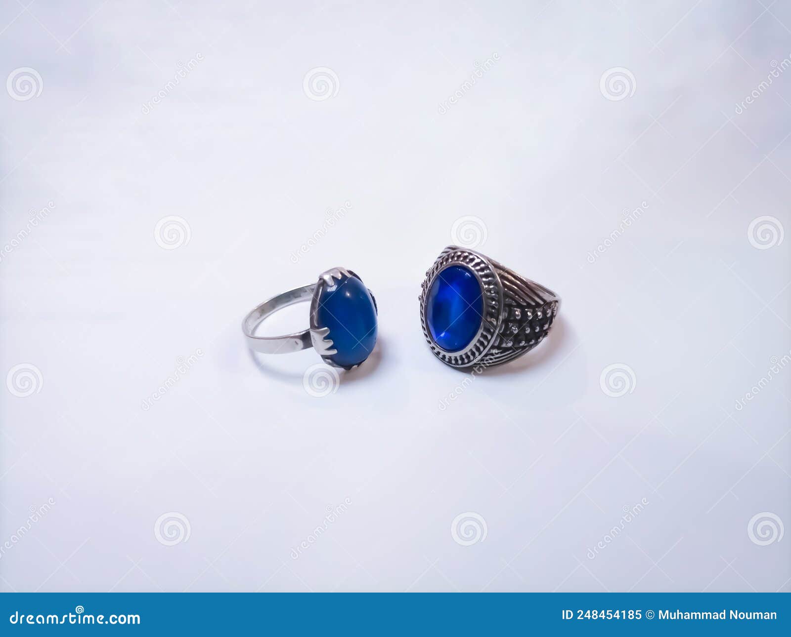 Blue Round Expensive Stone Rings, White Background Stock Image - Image ...