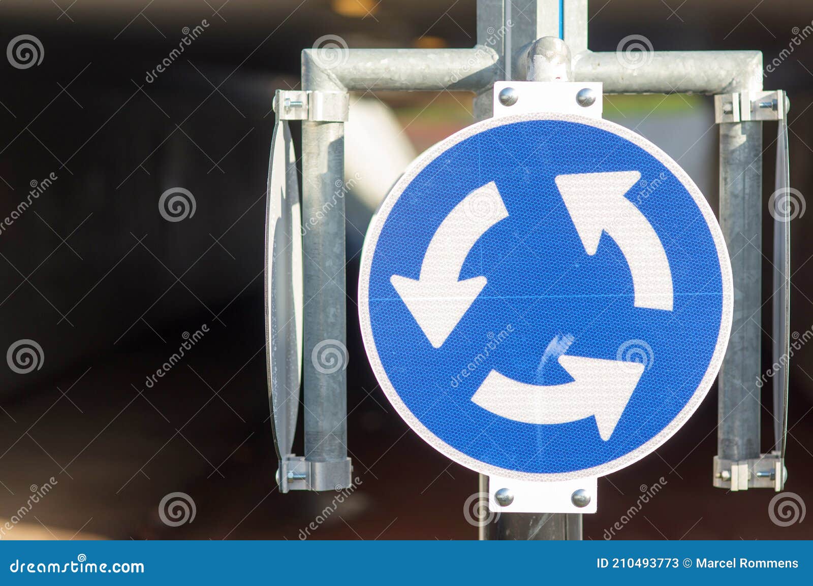 Blue roundabout road sign stock image. Image of roundabout - 210493773