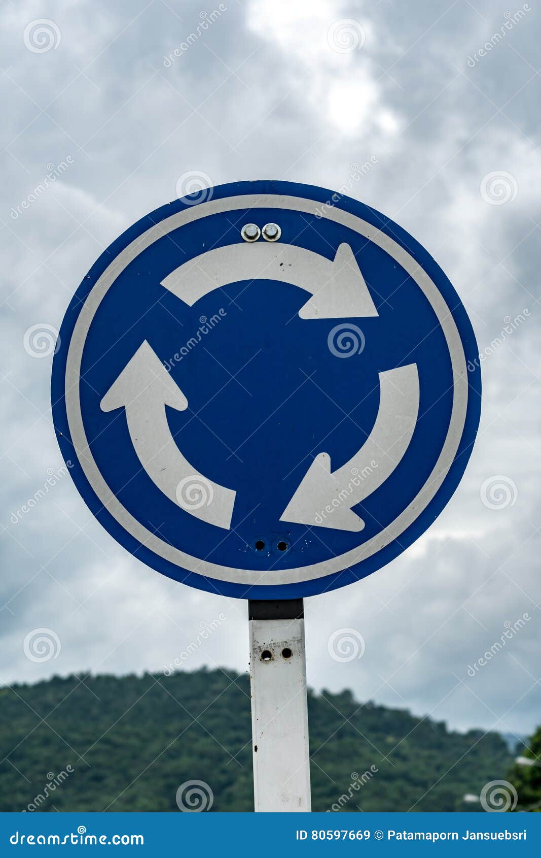 Blue Roundabout Sign With White Arrows Clockwise Stock Image ...