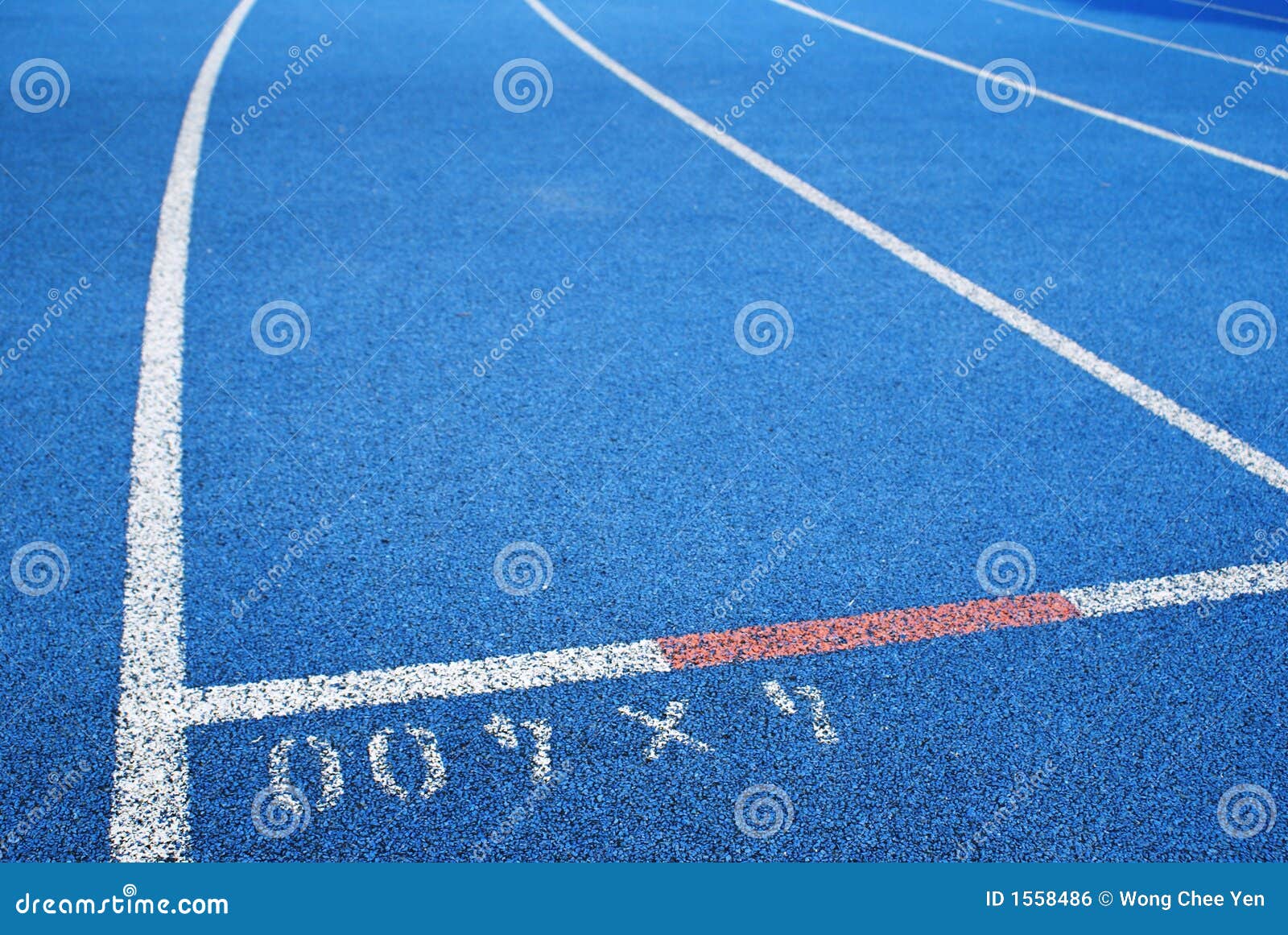 Blue running track stock photo. Image of marking, competition - 1558486
