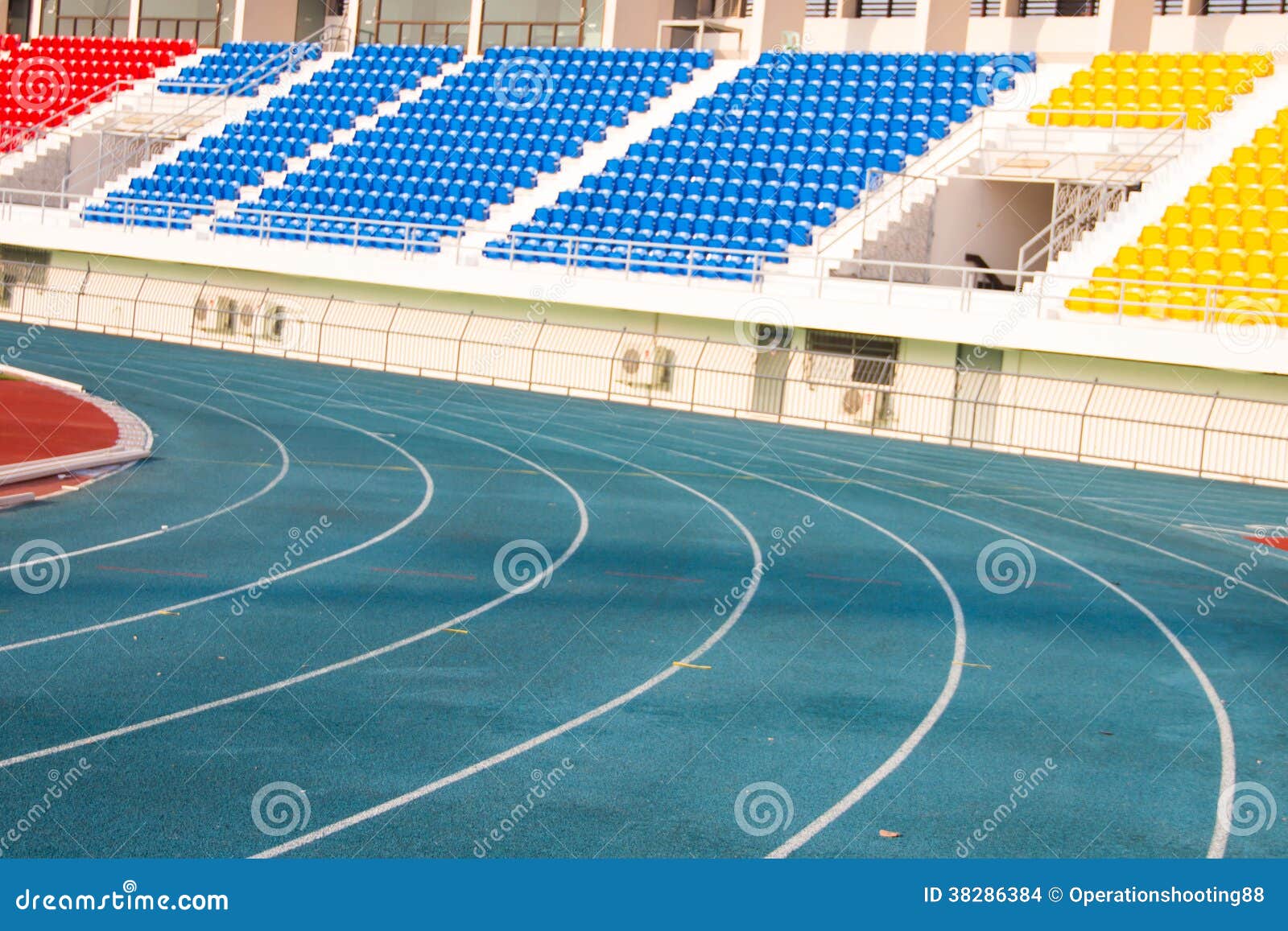 Blue running track stock photo. Image of stadium, surface - 38286384