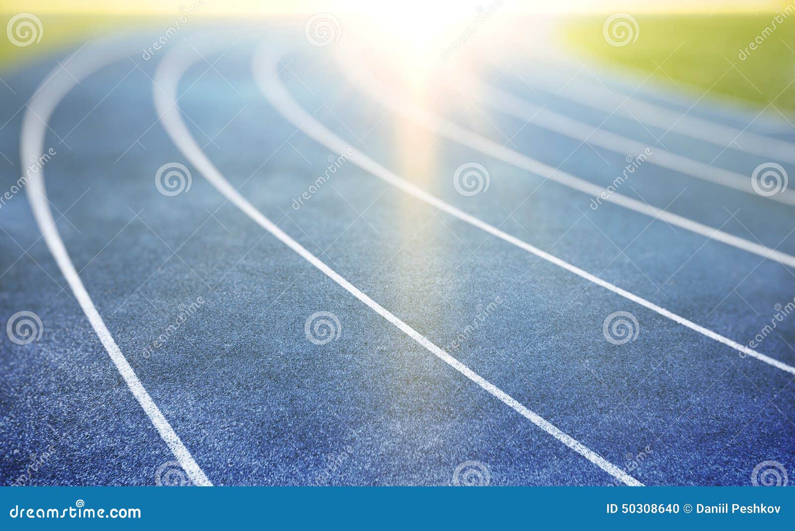 Blue running track stock photo. Image of competition - 50308640