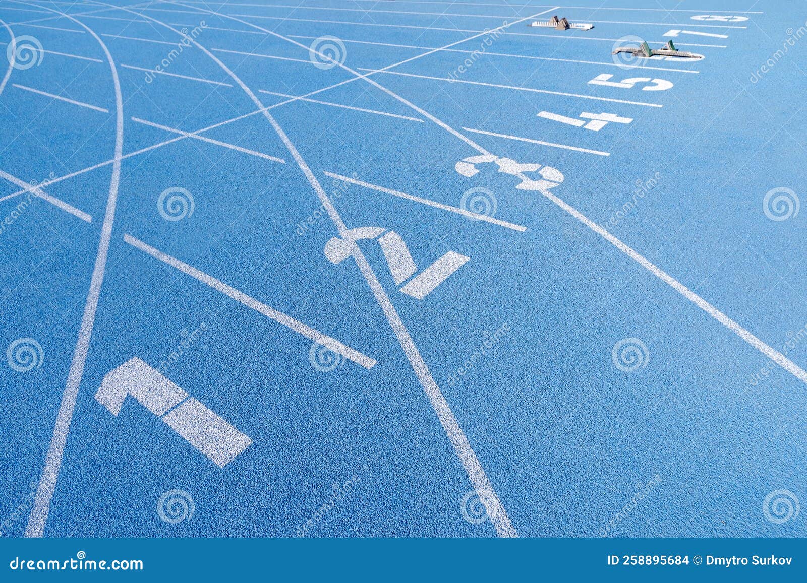 Blue Running Track and Numerals Stock Photo - Image of single, starting ...