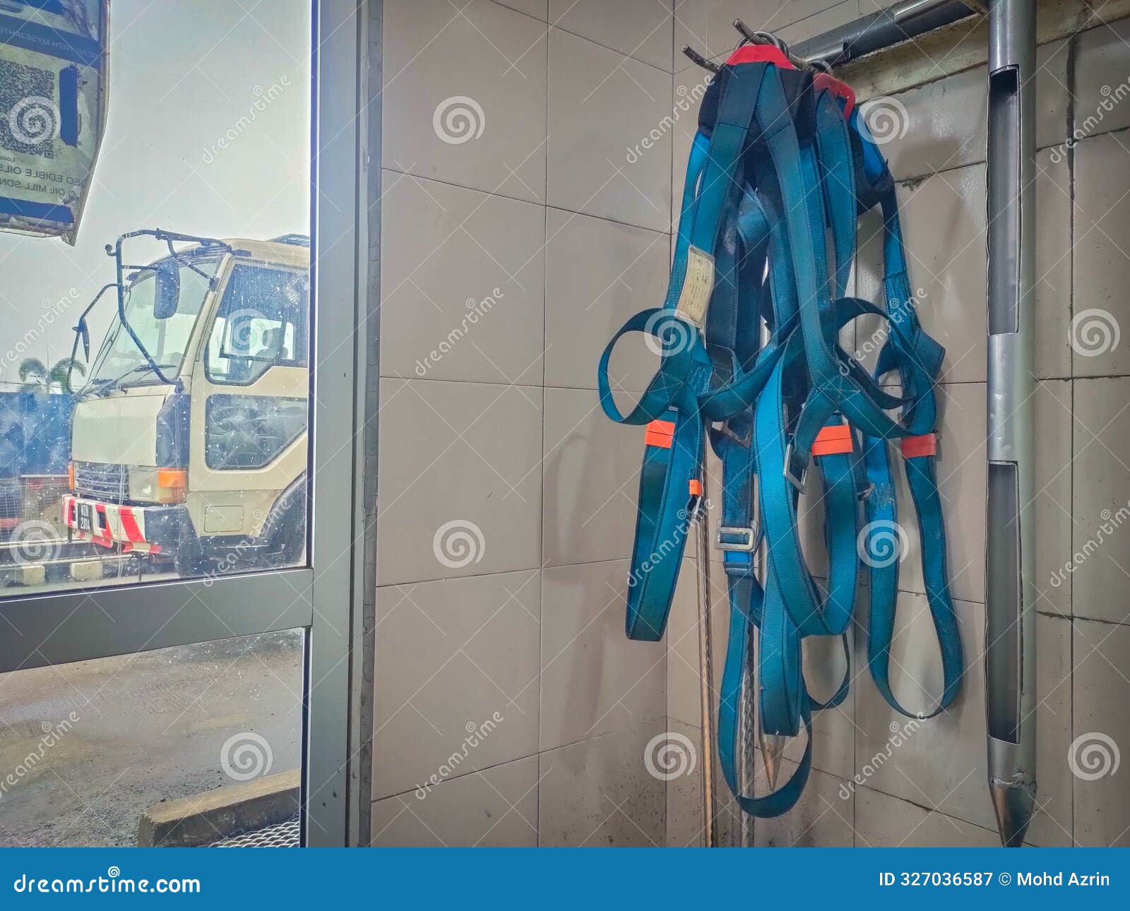 A Blue Safety Harness is Hung Next To the Sample Taking Equipment Stock ...
