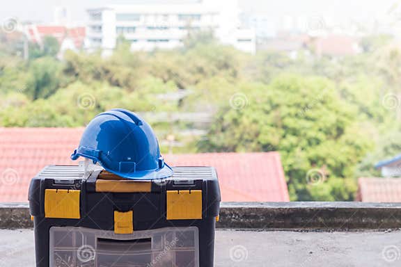 The Blue Safety Helmet on the Tool Box at Construction Site Stock Photo ...