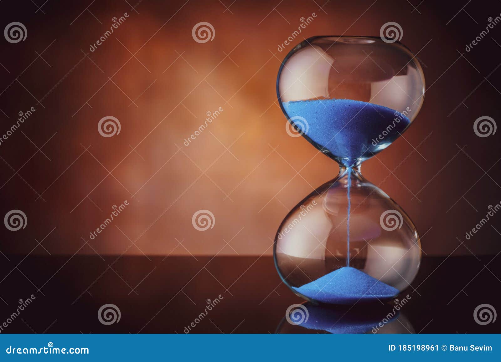 Blue Sand Hourglass on Old Background Stock Image - Image of flowing ...