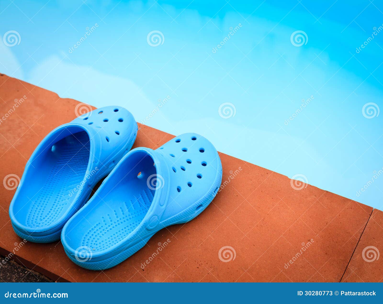 Blue Sandals on the Poolside Stock Image - Image of holiday, closeup ...