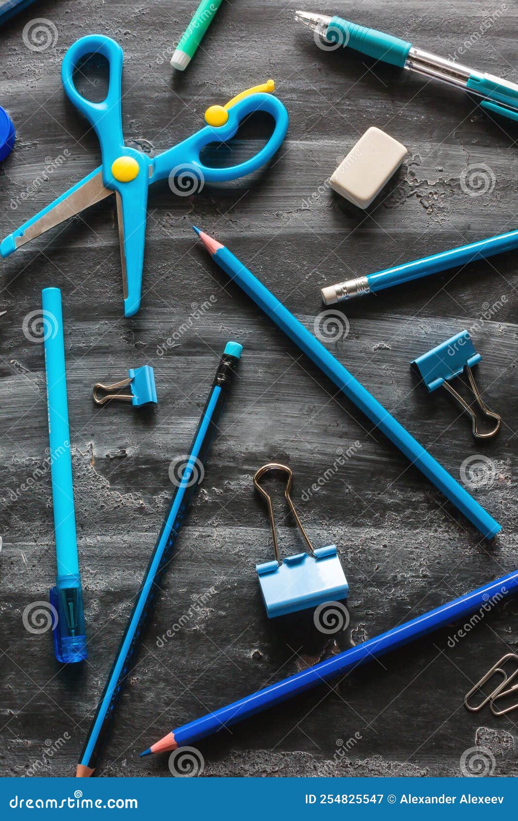 Blue School Supplies on a Blackboard Stock Image - Image of chalkboard ...