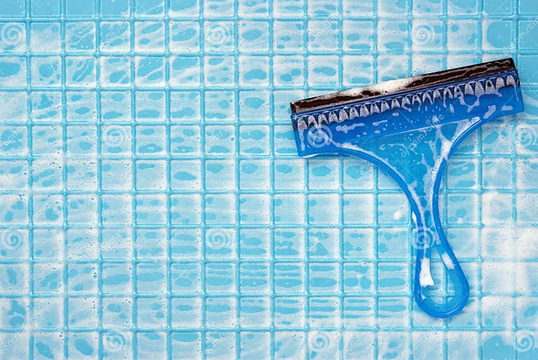 Blue scraper for cleaning stock photo. Image of cells - 90657554