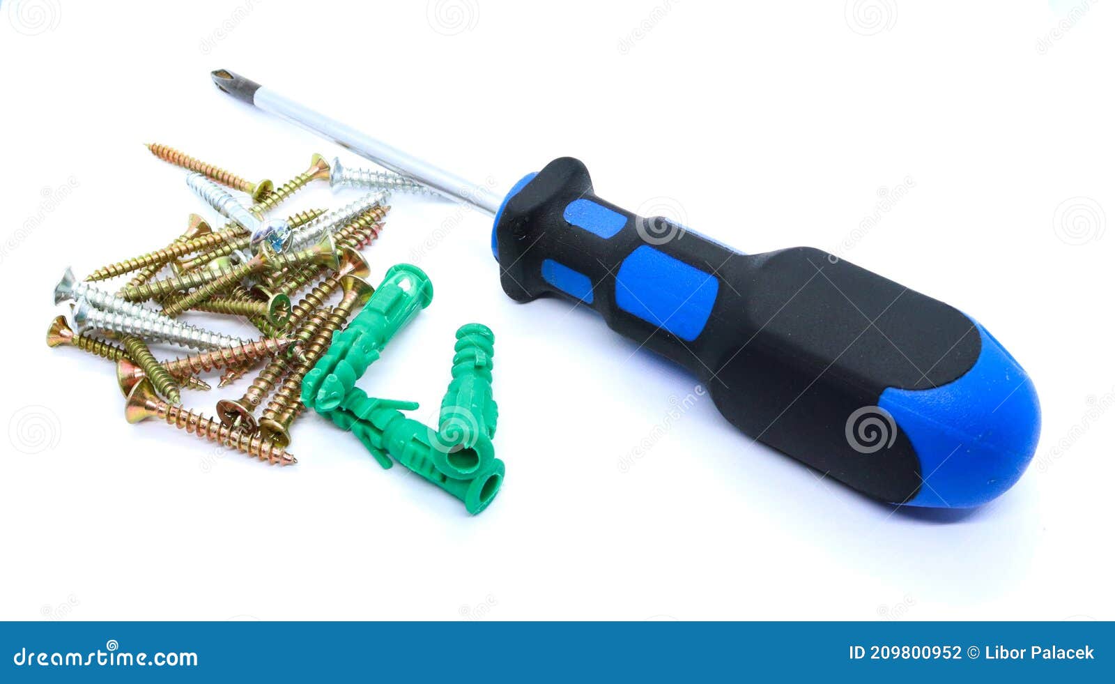 Blue Screwdriver with Dowels and Screws Working Tools. Stock Photo ...