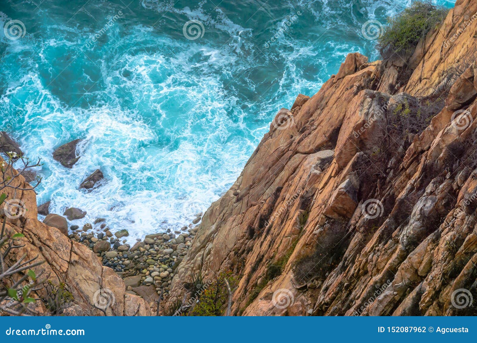 Blue Sea at the Bottom of a Cliff Stock Photo - Image of beautiful ...
