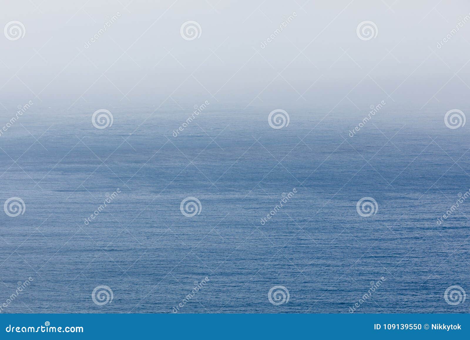 Blue sea and mist backdrop stock photo. Image of haze - 109139550