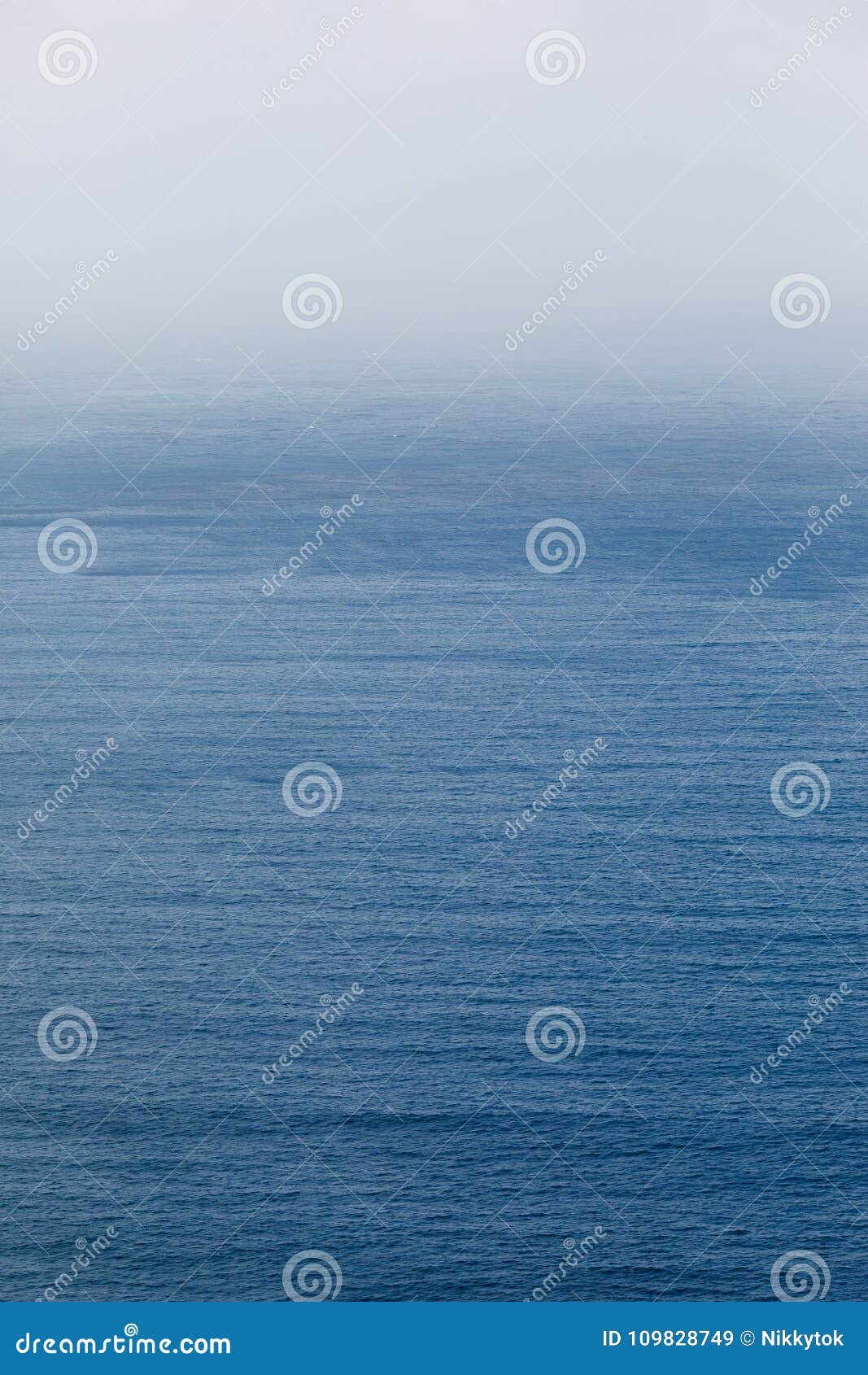 Blue sea and mist backdrop stock image. Image of vacation - 109828749