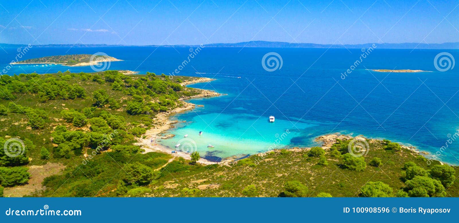 Blue sea shore stock photo. Image of rocks, sithonia - 100908596