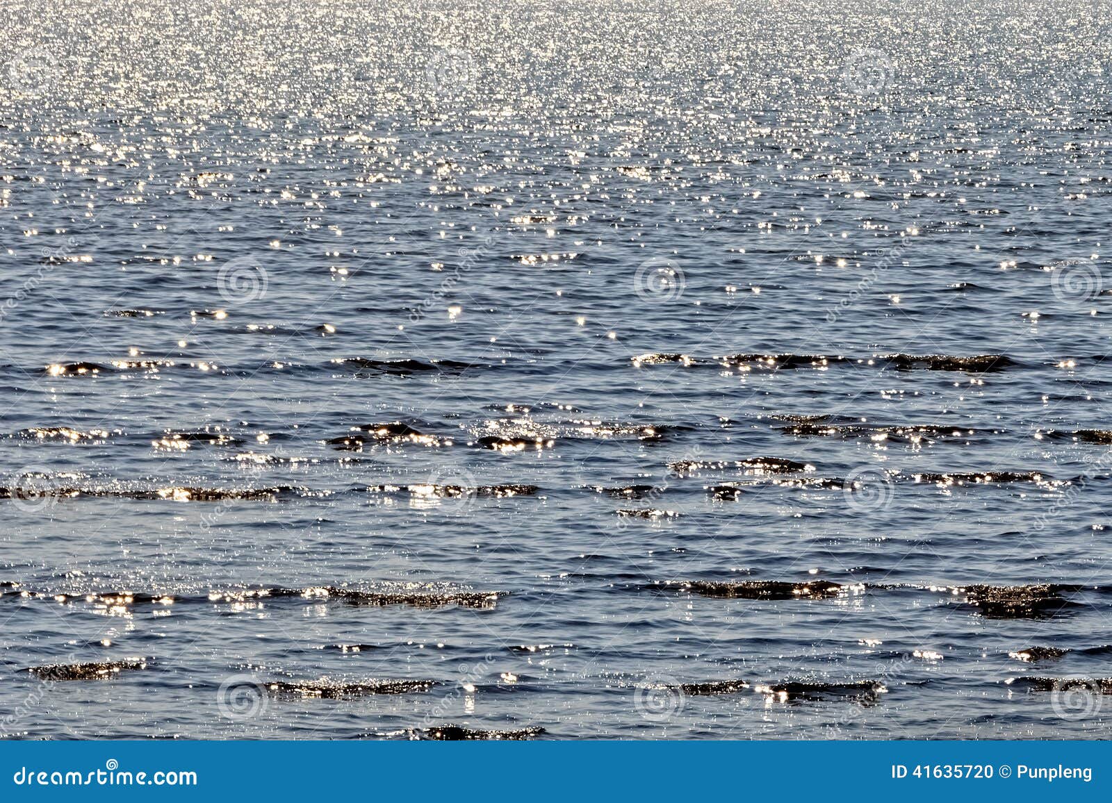 Blue Sea with Waves and Glitter Reflection on Water Stock Photo - Image ...