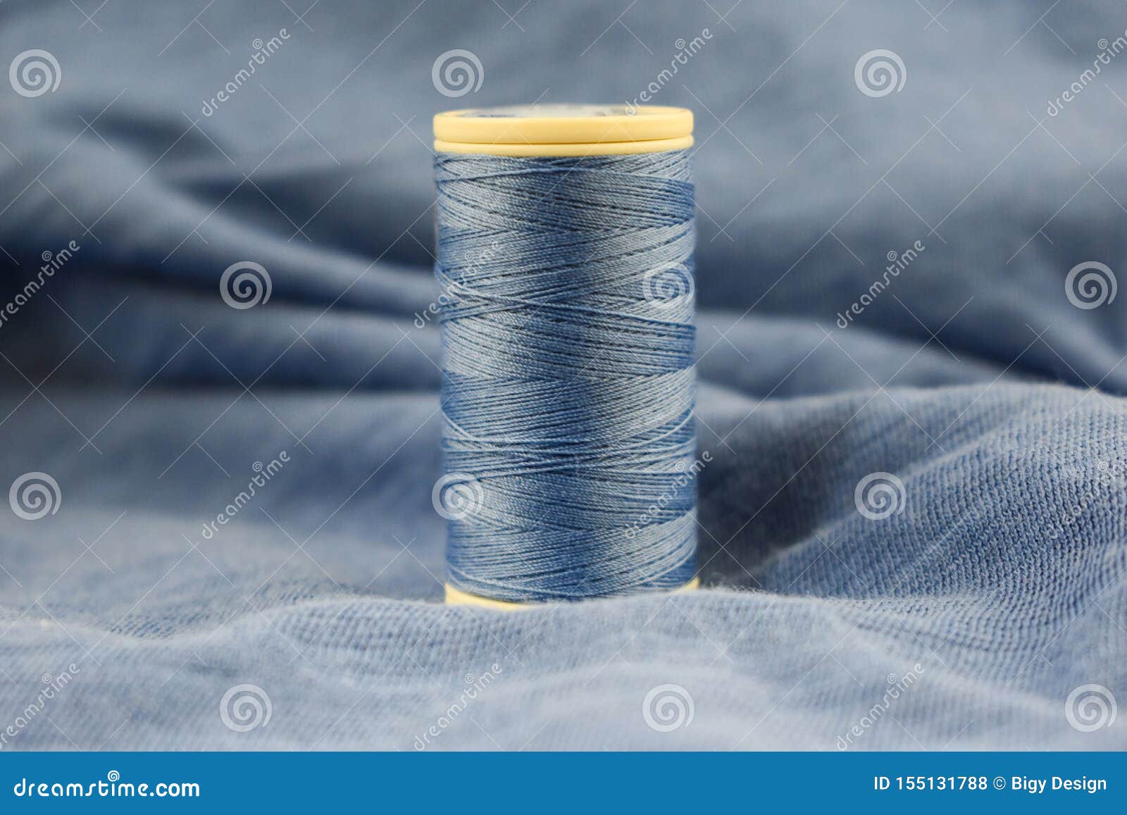 Blue Sewing Thread on Blue Fabric. Stock Photo - Image of accessories ...